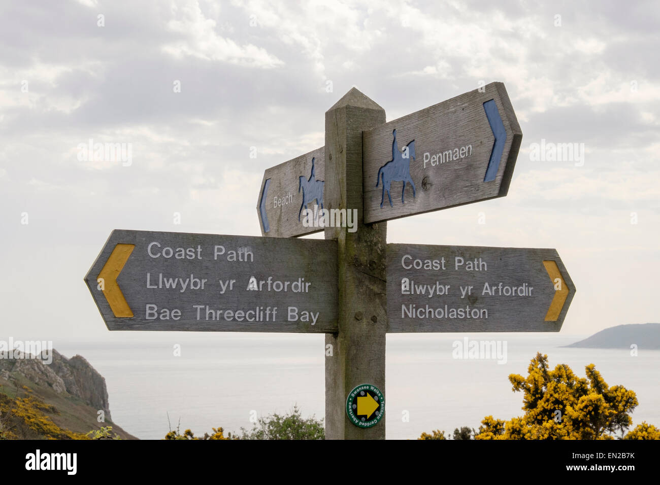 Wales Coast Path signpost and bridleway signs on Gower Peninsula ...