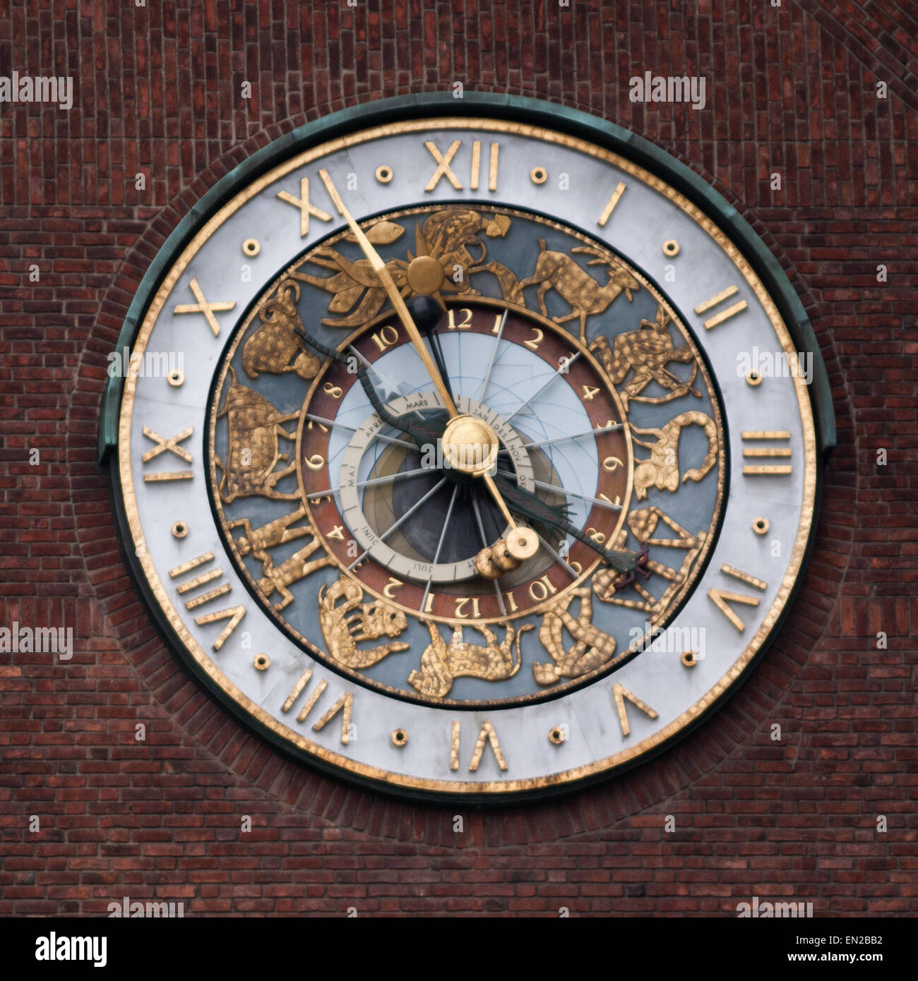 Astronomical clock on the northern side of the Oslo City Hall Stock ...