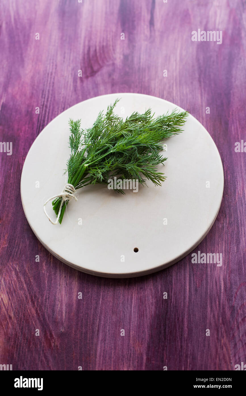 Bunch dill lying on a light plate Stock Photo - Alamy