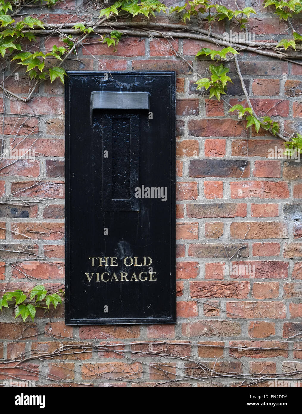 Private house domestic letter box built into a garden wall, 25th April ...