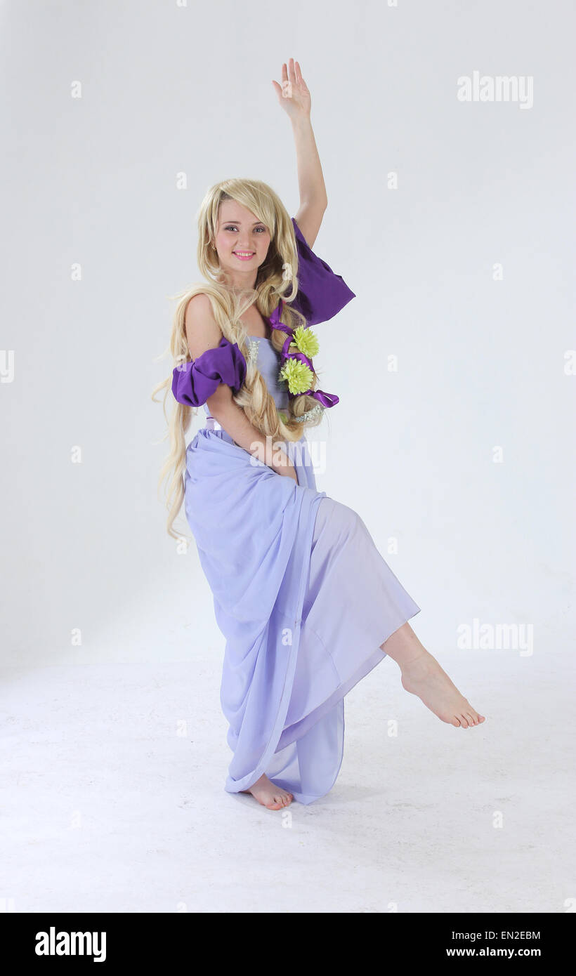 Long hair princess posing in studio Stock Photo - Alamy