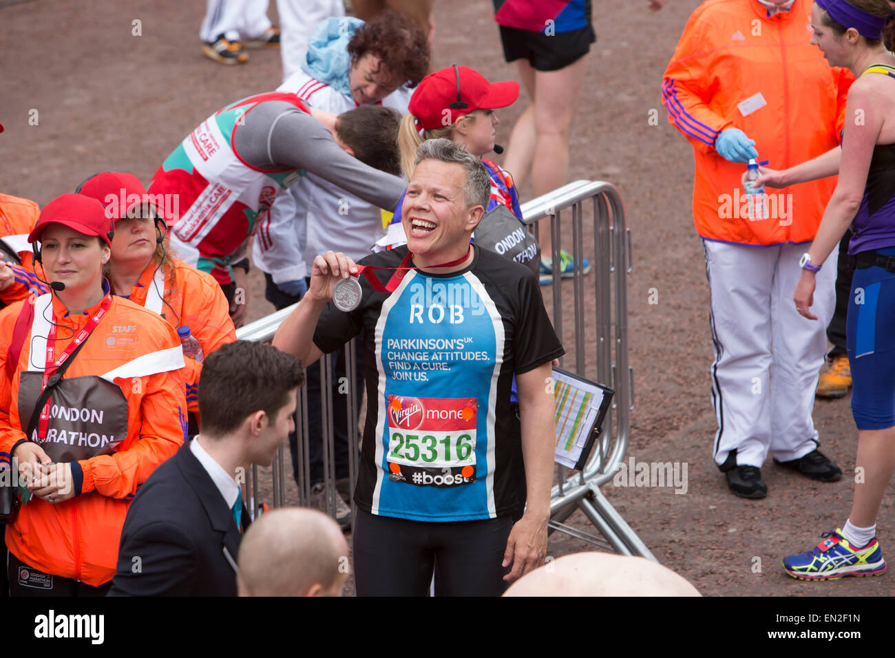 Robert Deering crosses the finish line at the Virgin money London ...