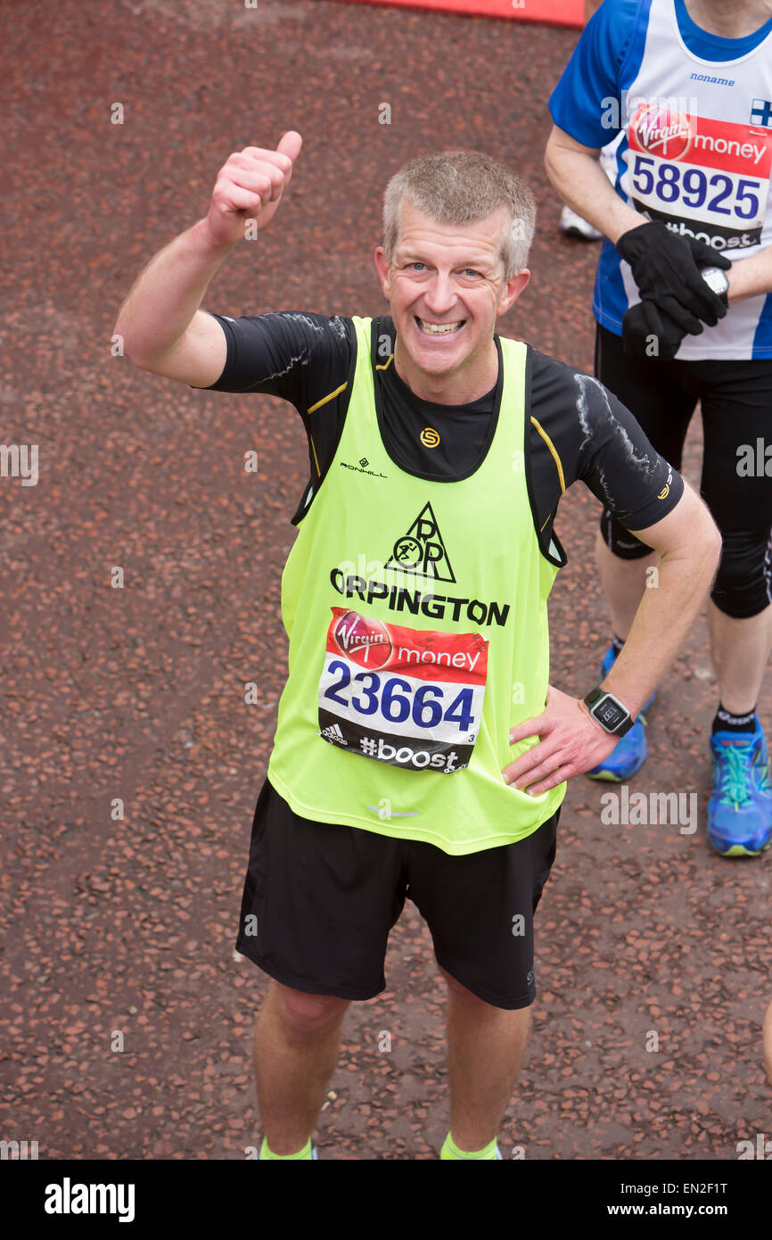 Andrew Ingram crosses the finish line at the Virgin money London ...