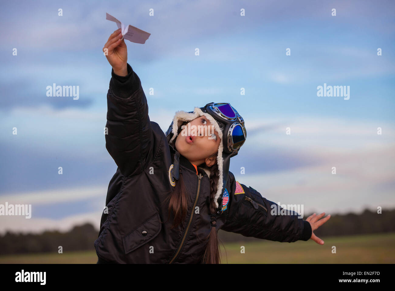 Travel kid or child playing with paper plane Stock Photo - Alamy