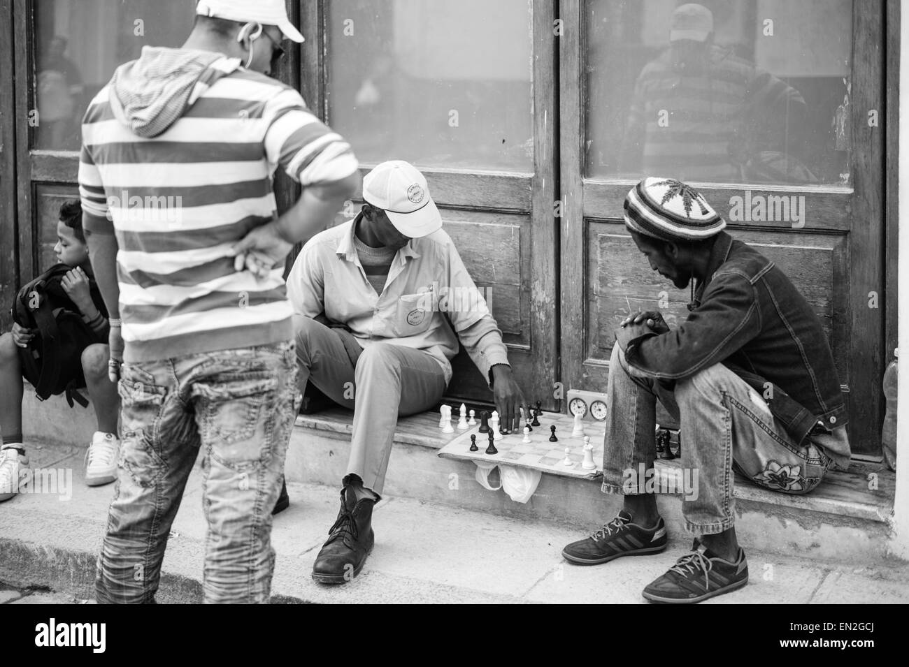 Cuban men playing a timed game of chess on the street in old Havana ...