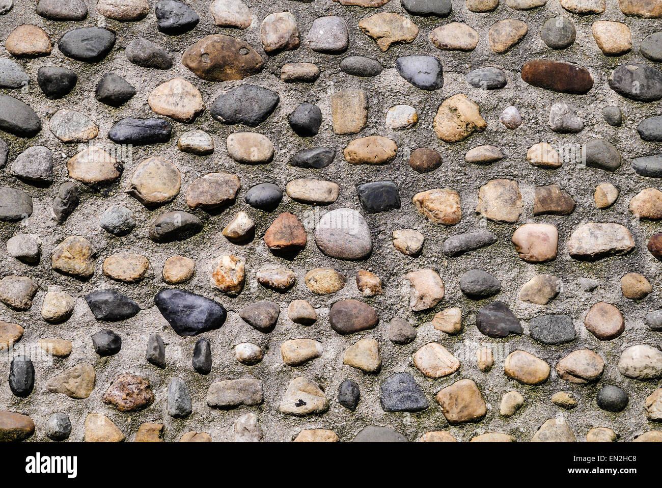 Pebble wall background Stock Photo - Alamy