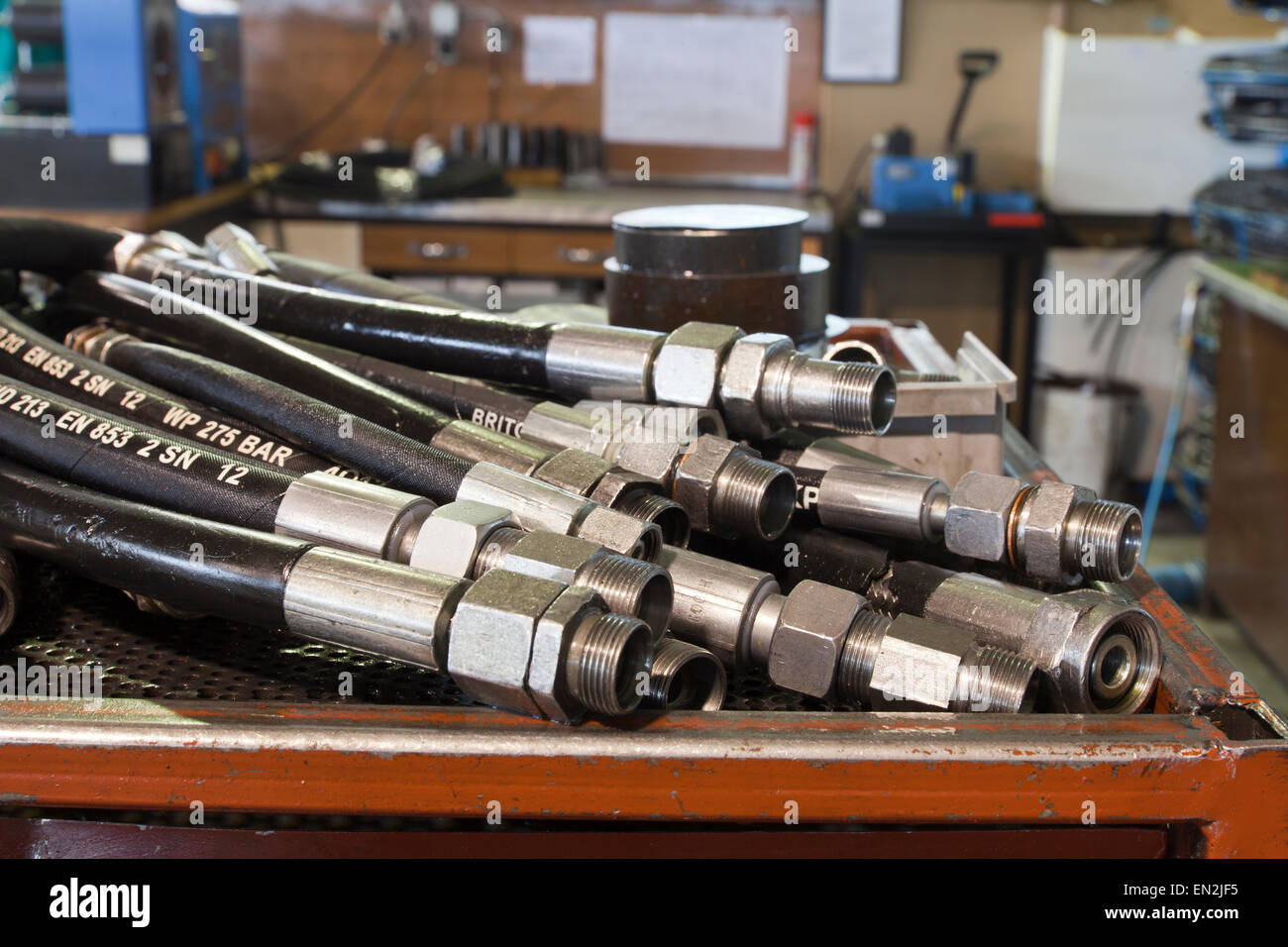 hydraulic hoses on the table in the workshop Stock Photo - Alamy