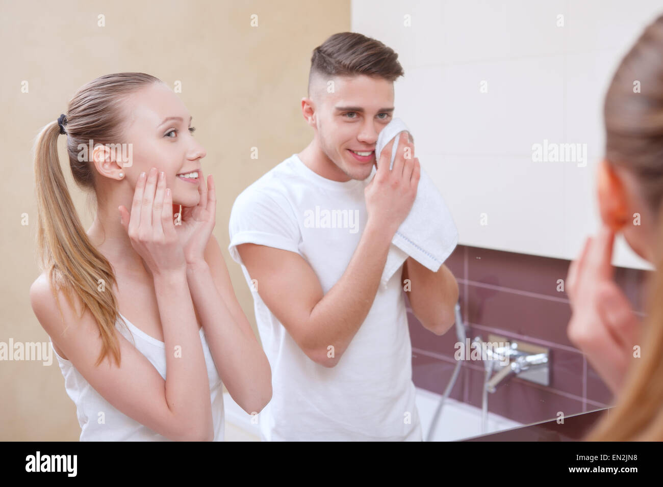 Lovely pair doing morning routine Stock Photo - Alamy