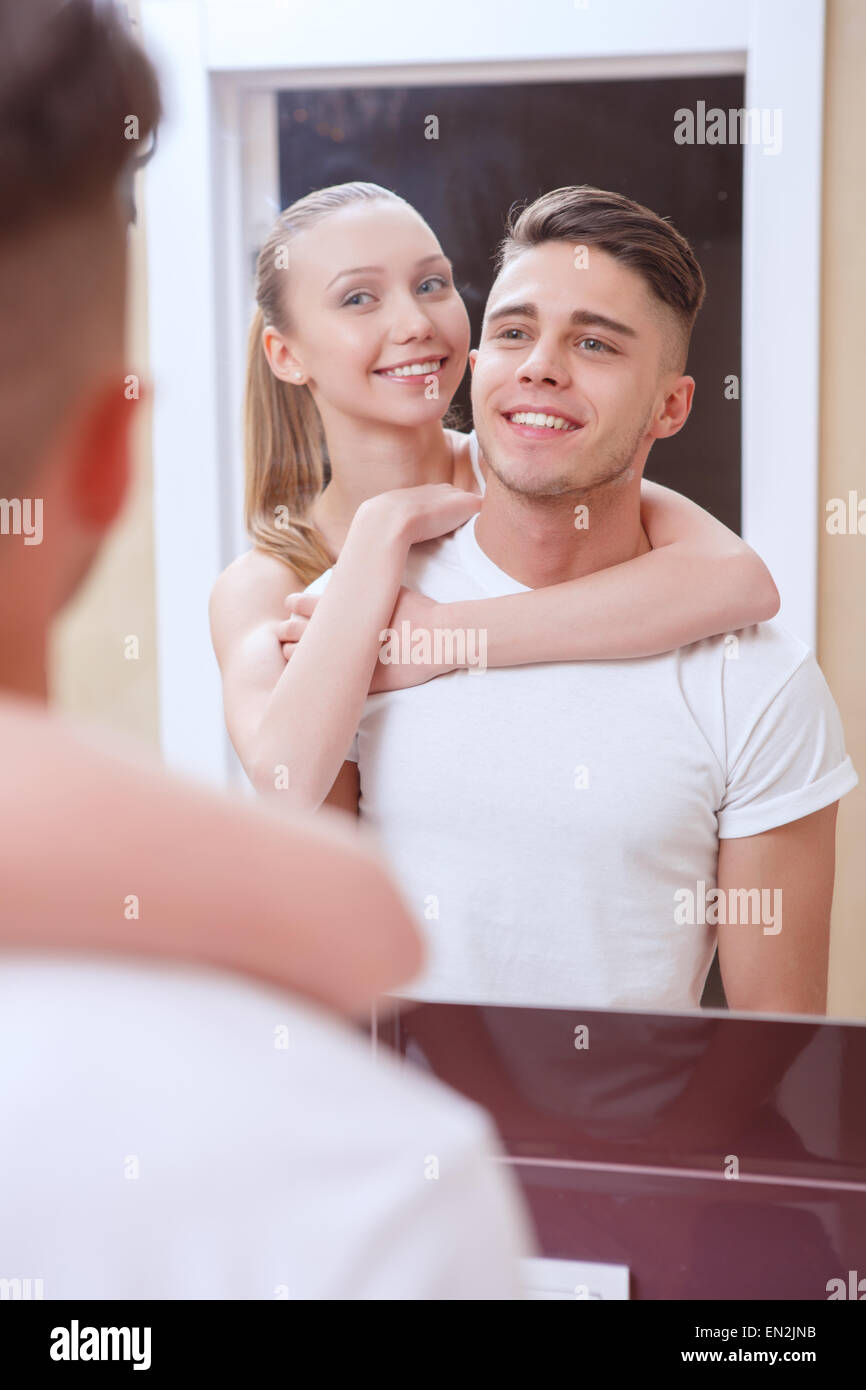 Man hug woman mirror hi-res stock photography and images - Alamy