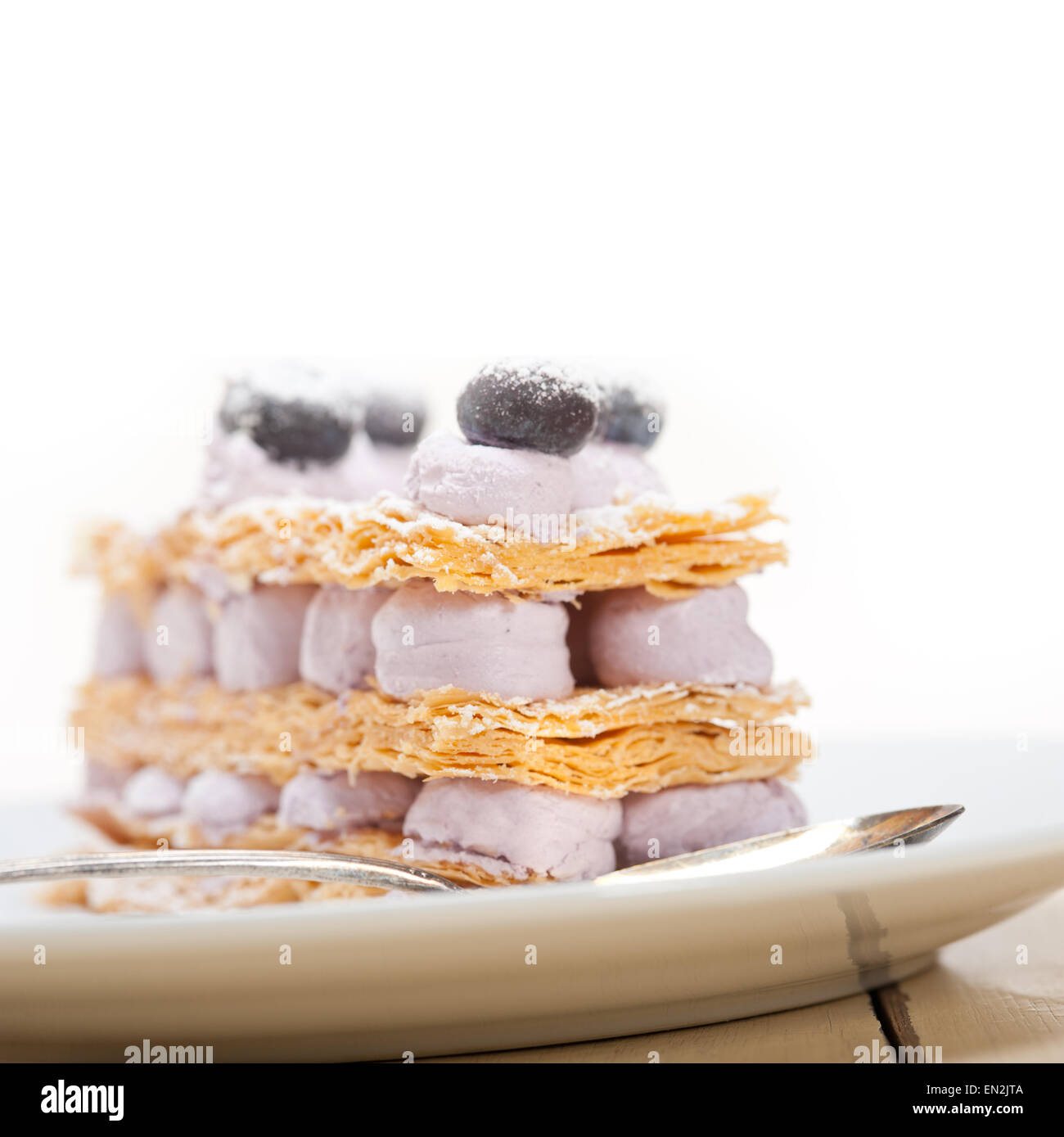 fresh baked napoleon blueberry and cream cake dessert Stock Photo - Alamy