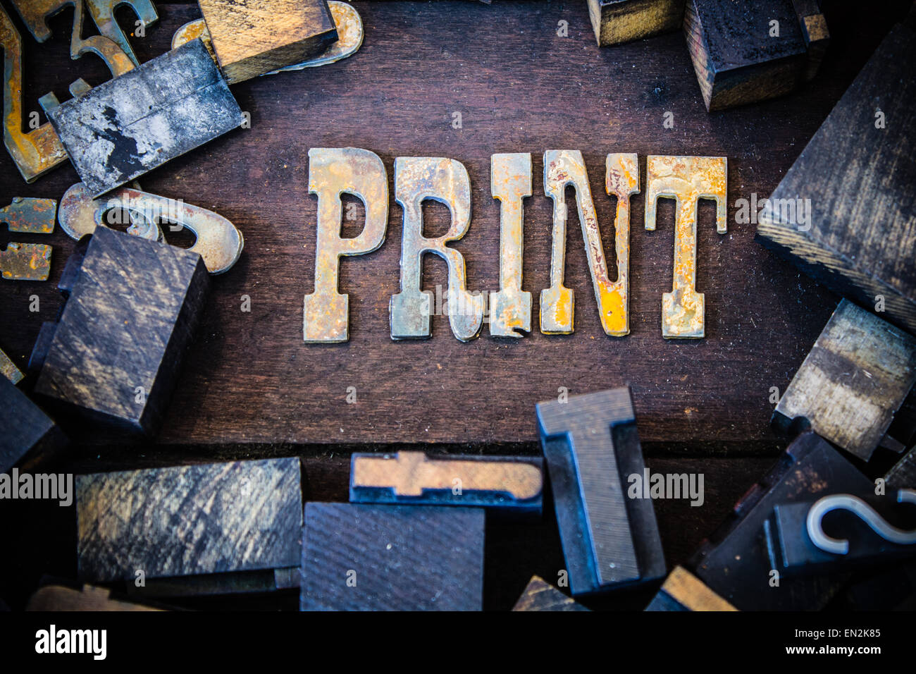 The word PRINT written in rusted metal letters surrounded by vintage ...
