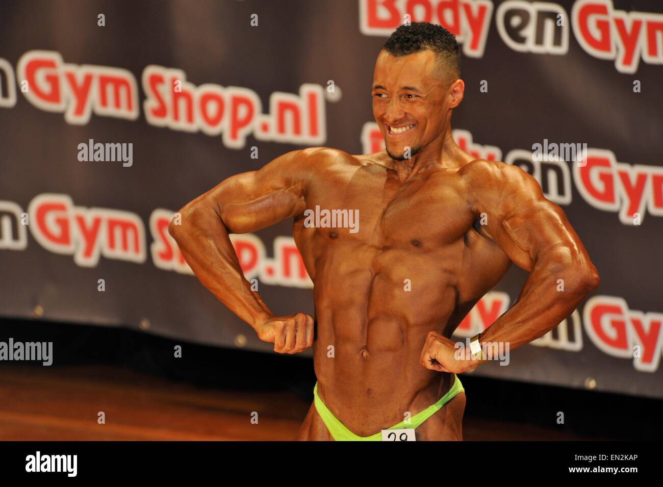 Schiedam, the Netherlands. 26th April, 2015. Male bodybuilder showing ...
