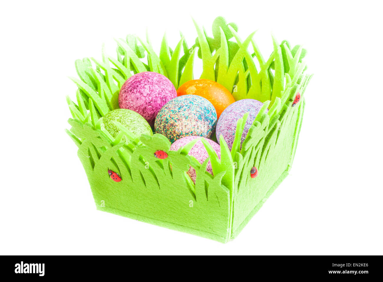 Easter eggs in the green nest Cut Out Stock Images & Pictures - Alamy