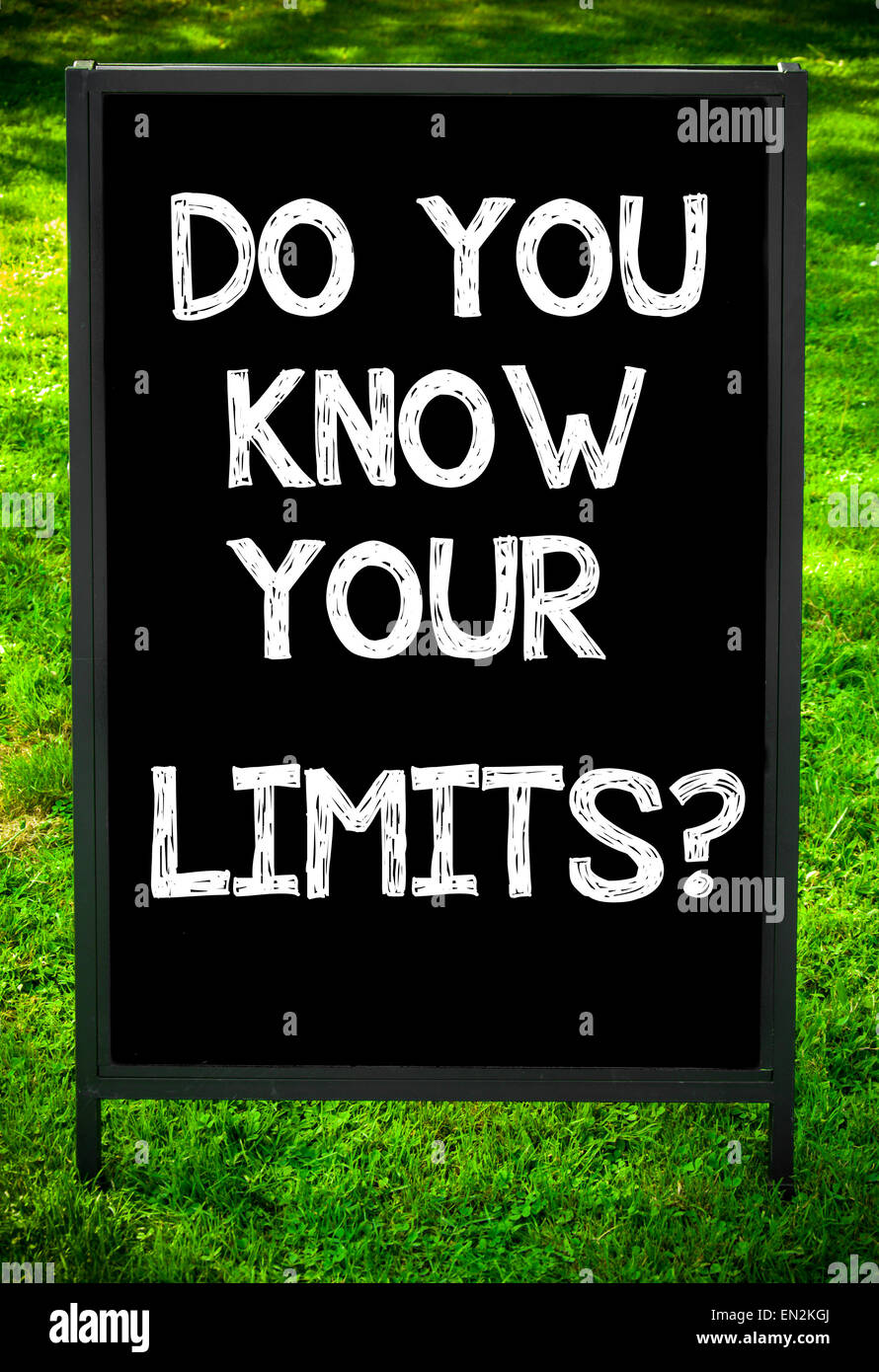 DO YOU KNOW YOUR LIMITS? message on sidewalk blackboard sign against ...