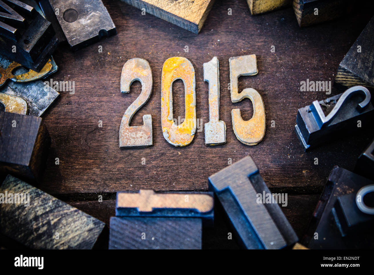 The year 2015 written in rusted metal letters surrounded by vintage ...
