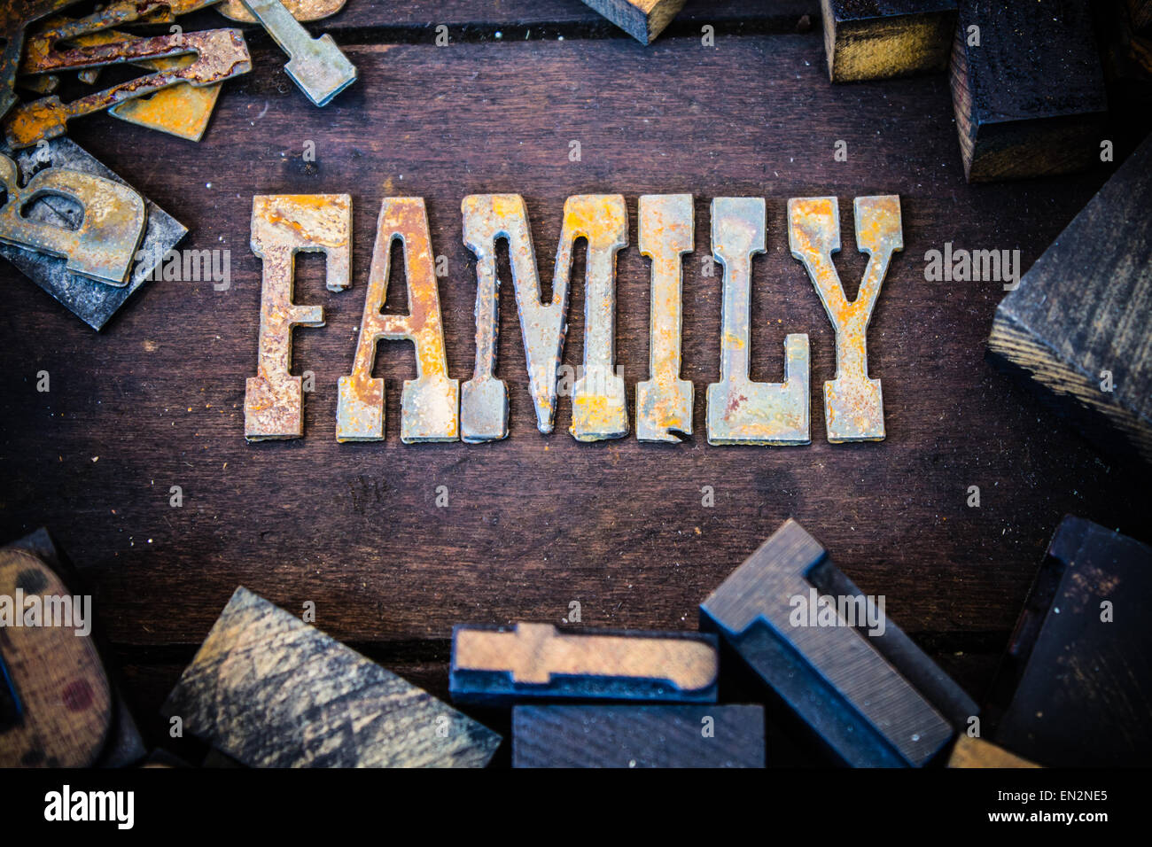 The word FAMILY written in rusted metal letters surrounded by vintage ...