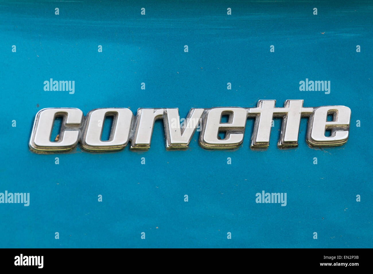 Corvette car word emblem on light blue background Stock Photo - Alamy