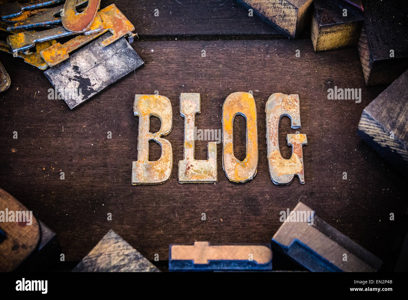The word blog written in rusted metal letters surrounded by vintage ...