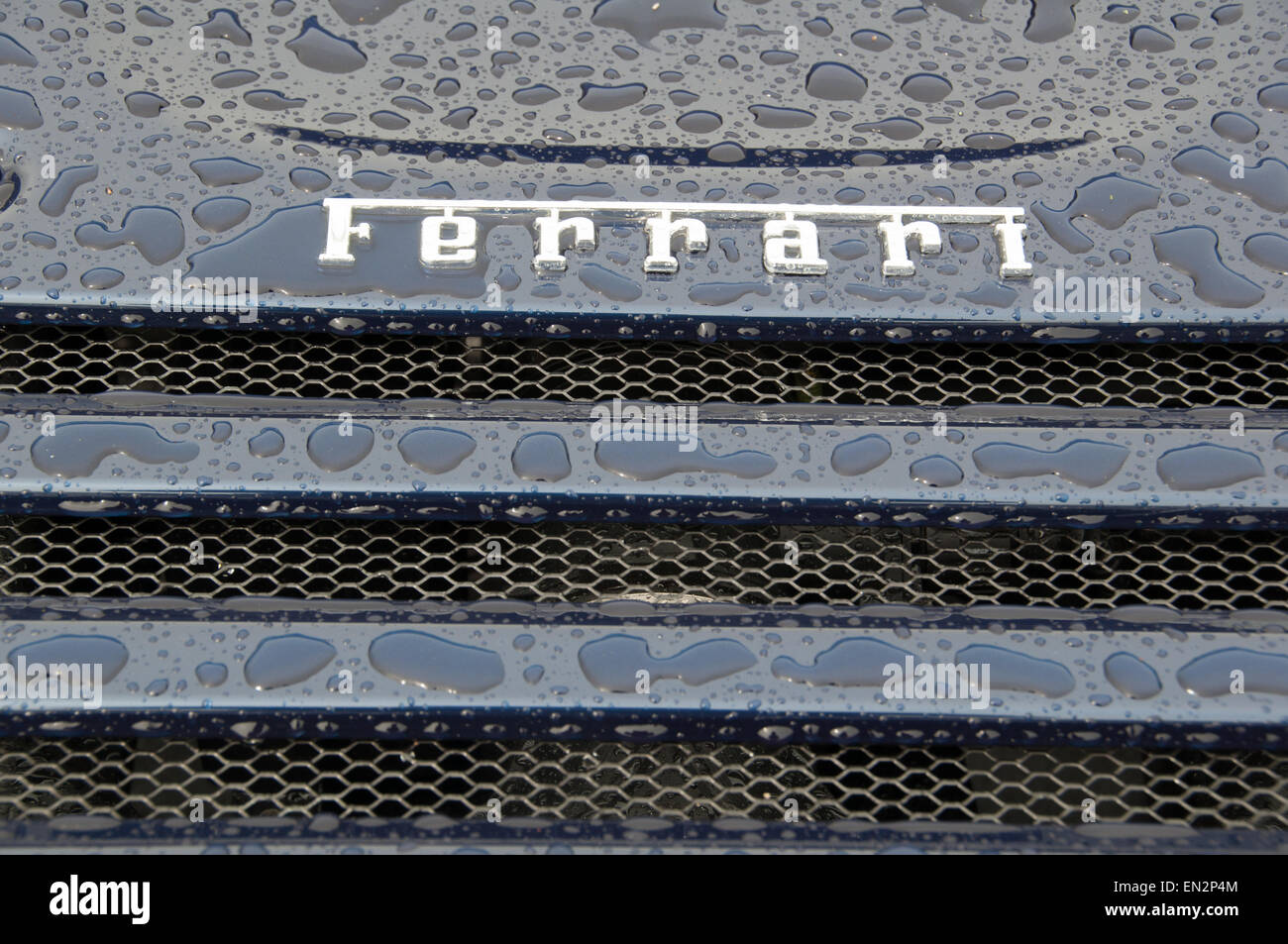 Blue ferrari luxury cars badge on rear bonnet Stock Photo - Alamy