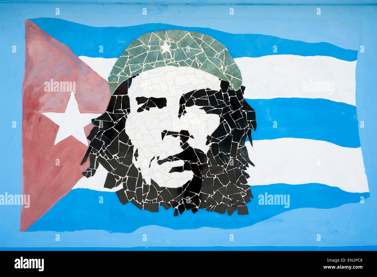 Stencil mural of revolutionary icon Che Guevara painted over a Cuban ...