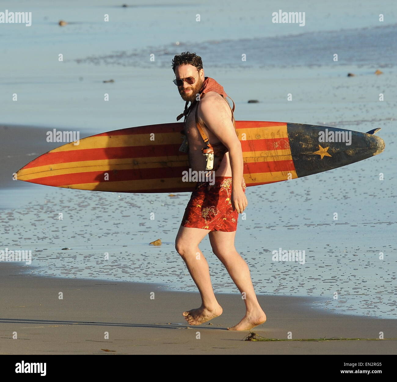 Actor Seth Rogen is lock and loaded on the beach and ready to surf for ...