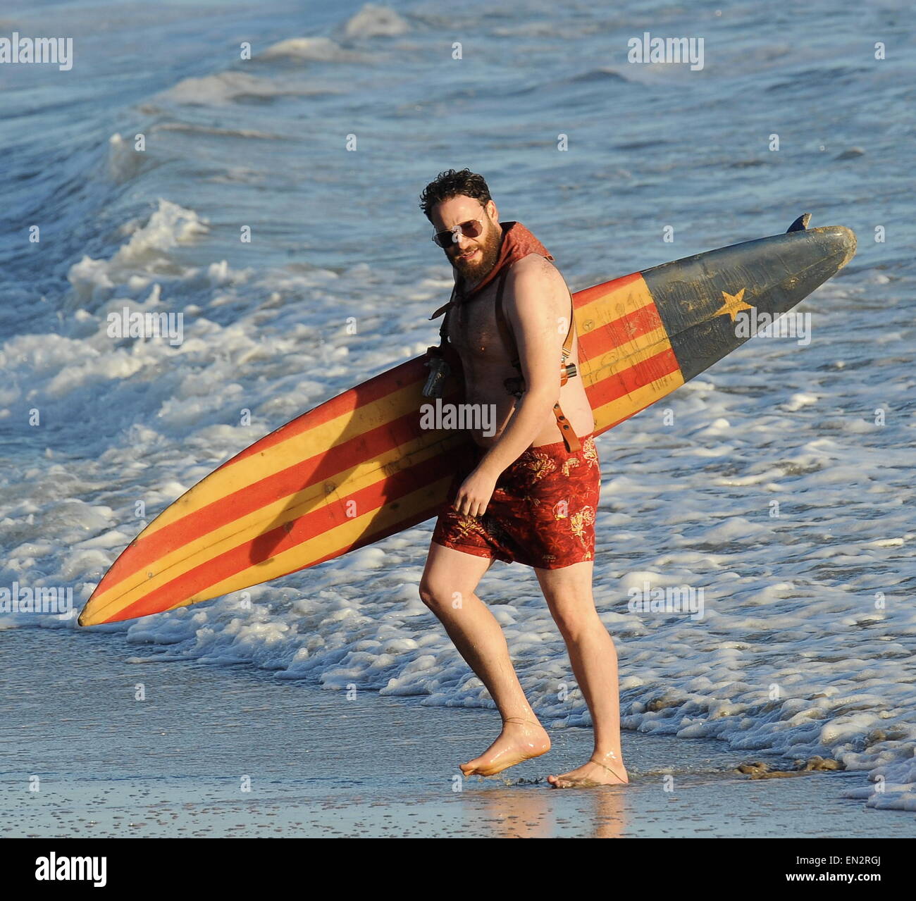 Actor Seth Rogen is lock and loaded on the beach and ready to surf for ...