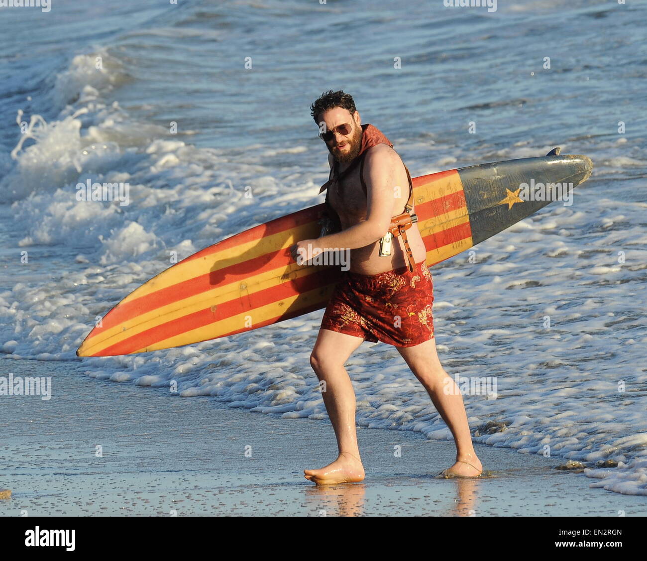 Actor Seth Rogen is lock and loaded on the beach and ready to surf for ...