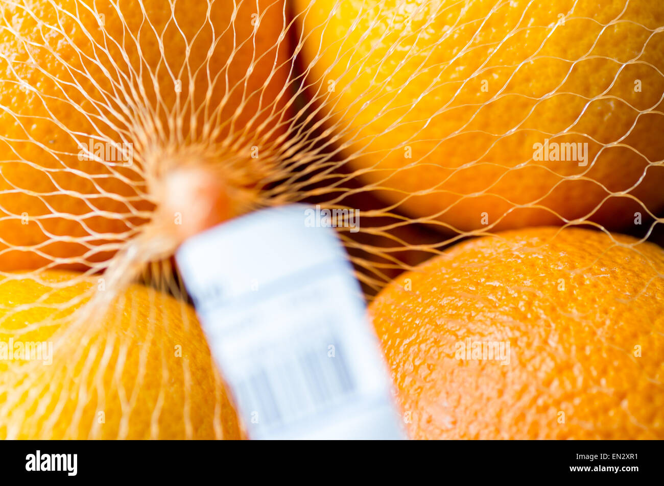 Oranges in the package at the supermarket. Barcode blurred Stock Photo ...