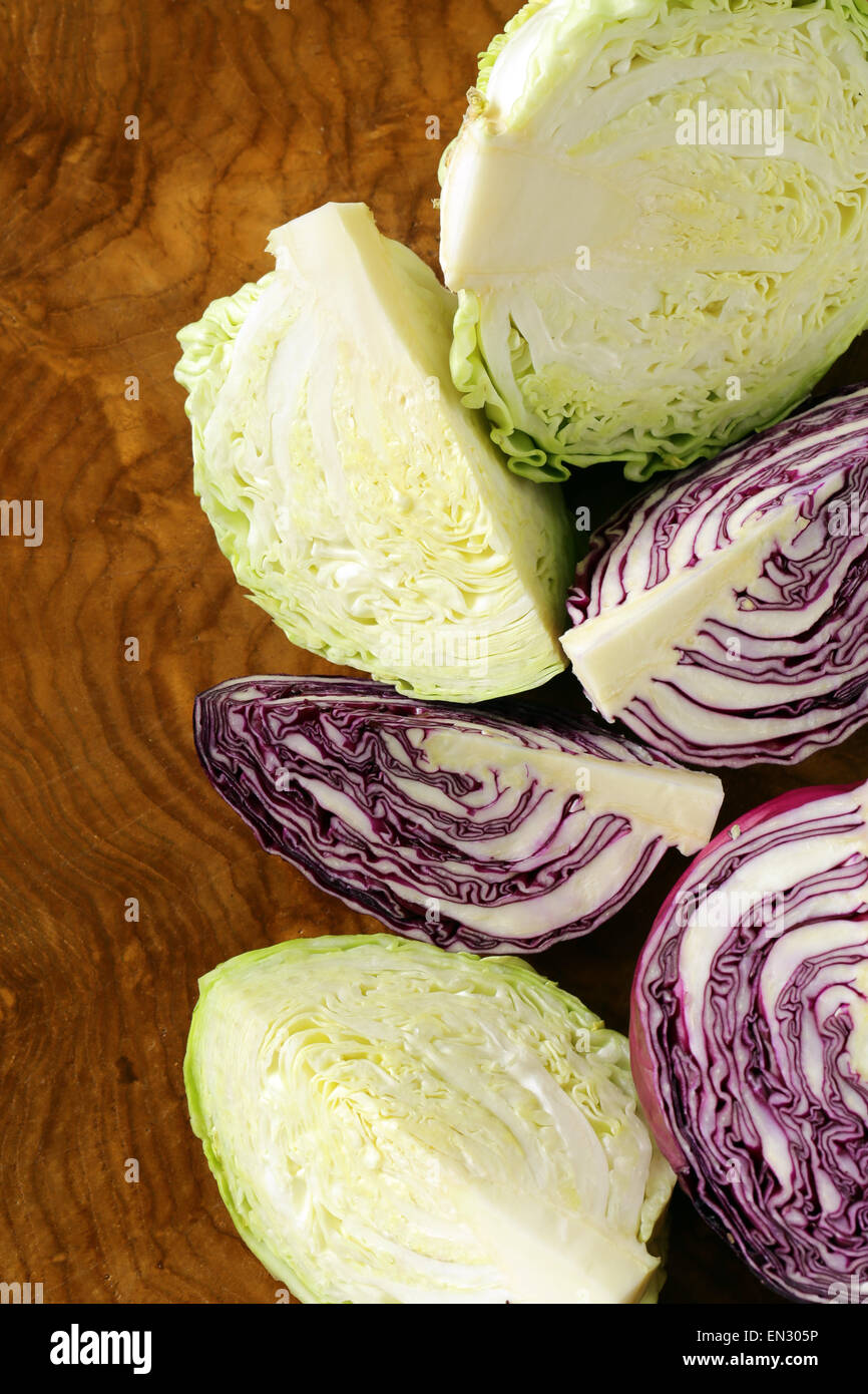 two varieties of cabbage (green and red) on a wooden table Stock Photo ...