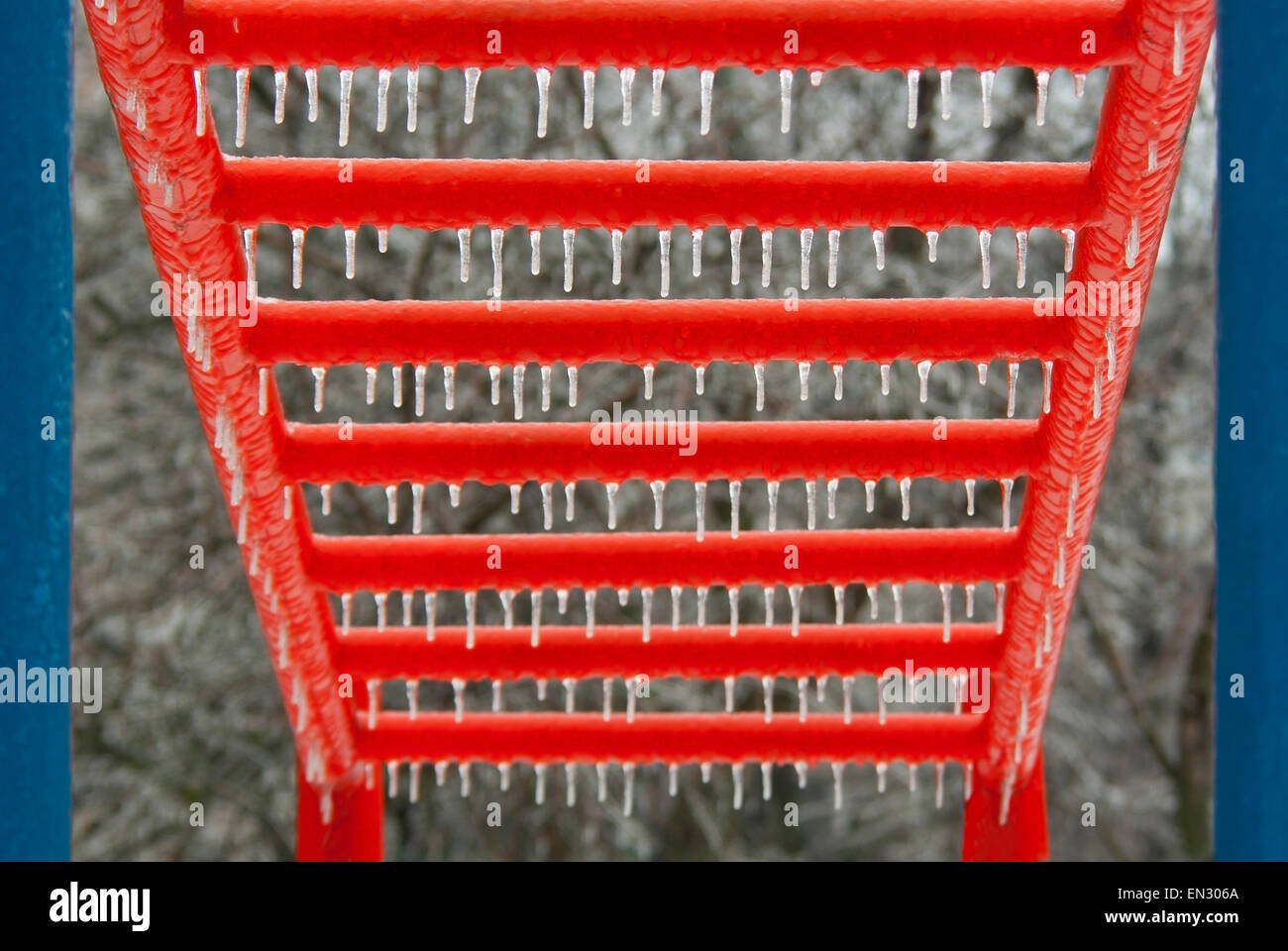 Icicles on the red staircase Stock Photo - Alamy