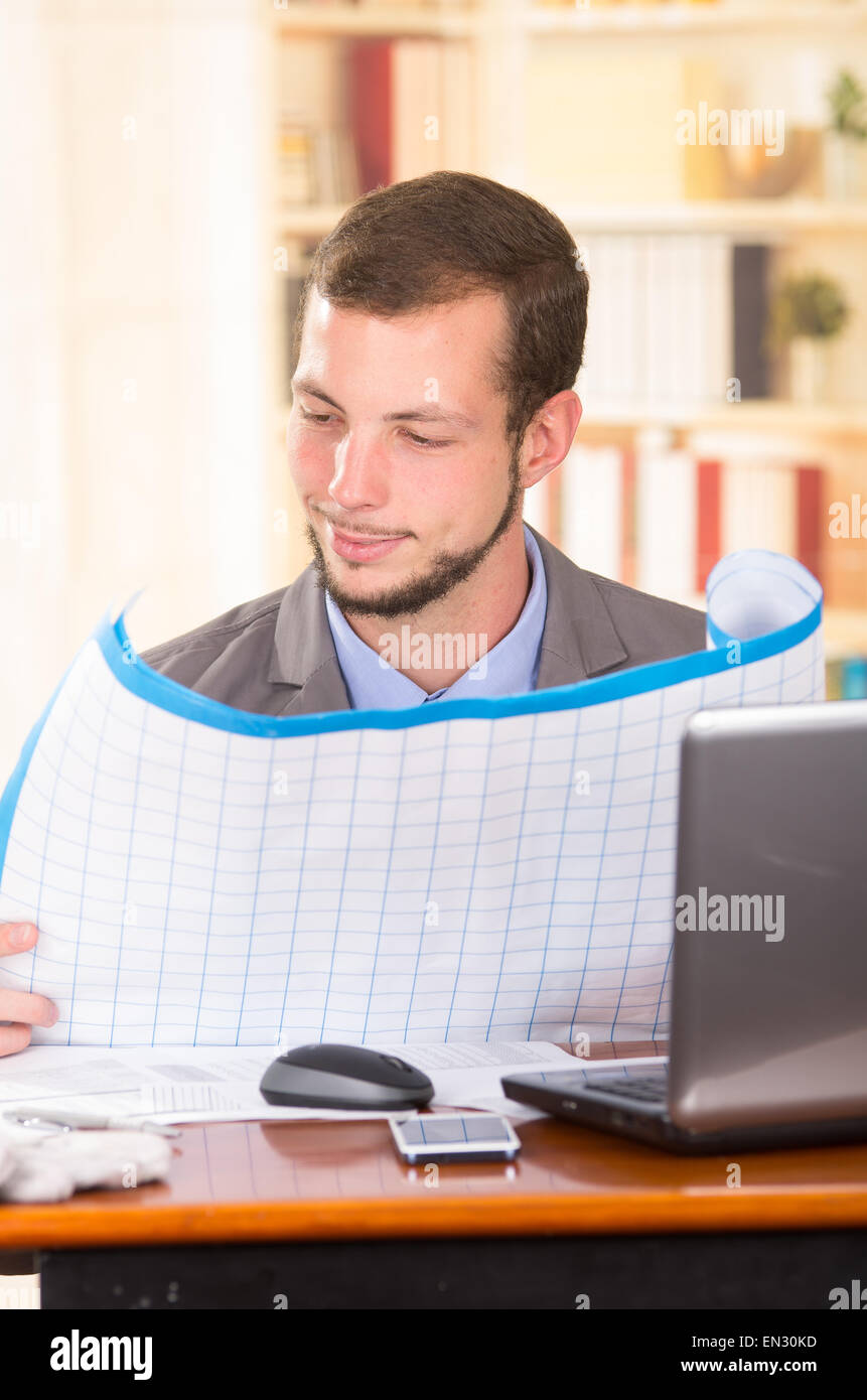 young handsome architect working in an office Stock Photo - Alamy