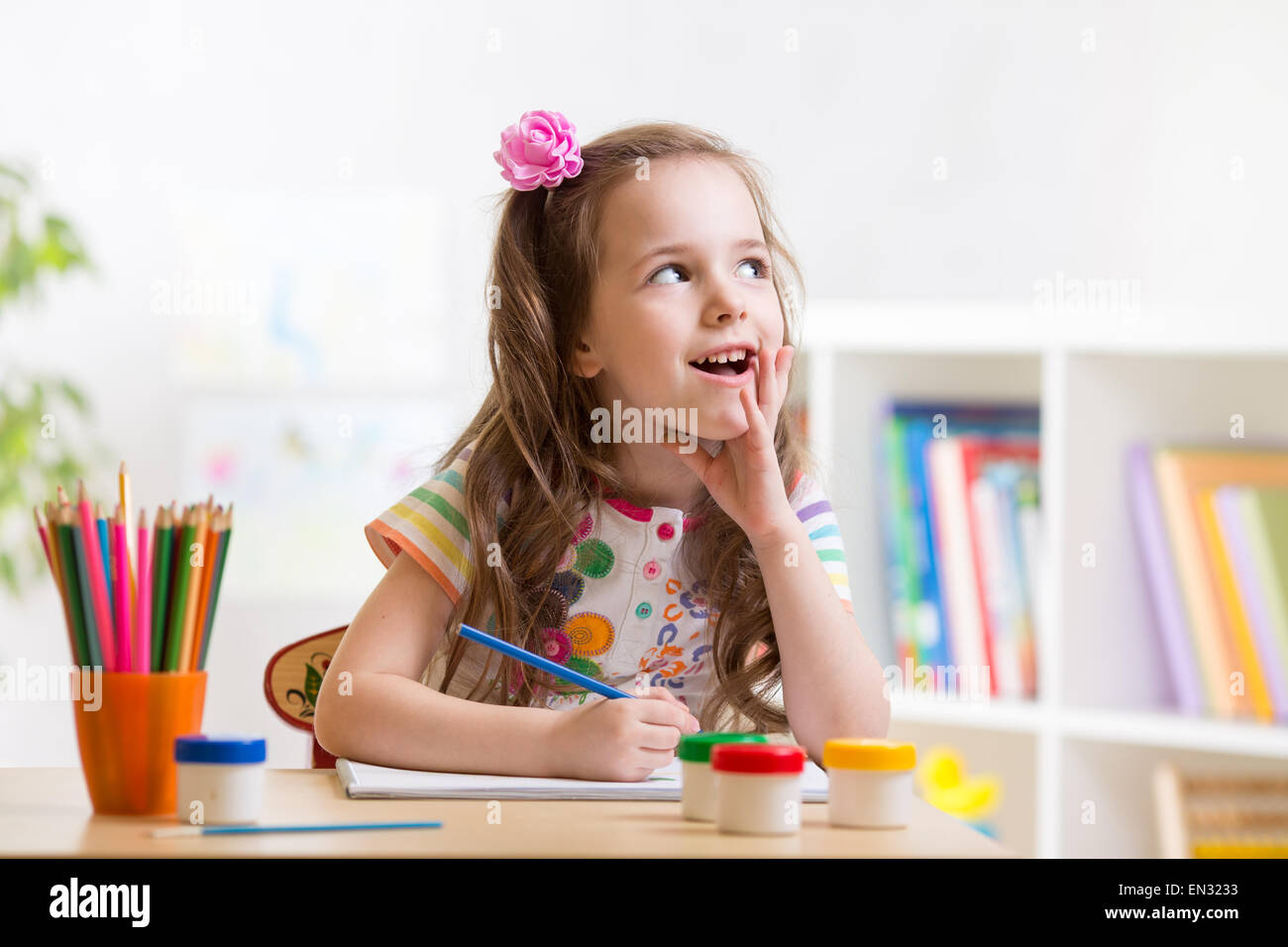Child with pencils hi-res stock photography and images - Alamy