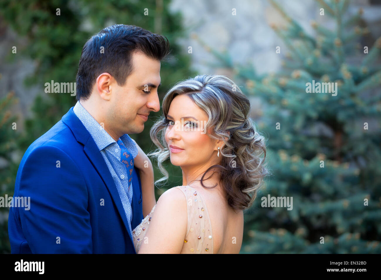 Newly wed couple outdoor on a summer day Stock Photo - Alamy