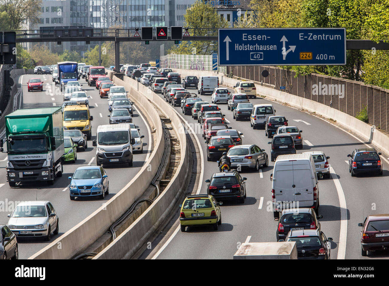 Motorway, Autobahn, A40, in the city of Essen, traffic jam in both ...