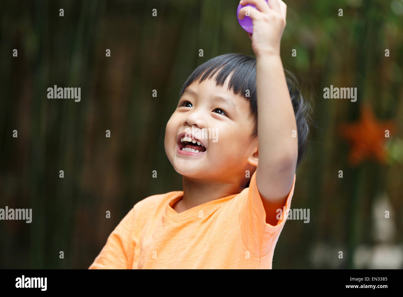 Lovely children are playing outside Stock Photo - Alamy
