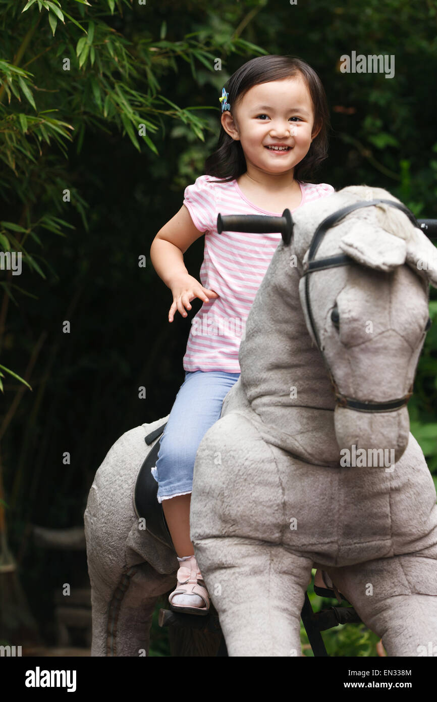 Riding Rocking Horse Stock Photos & Riding Rocking Horse Stock Images ...