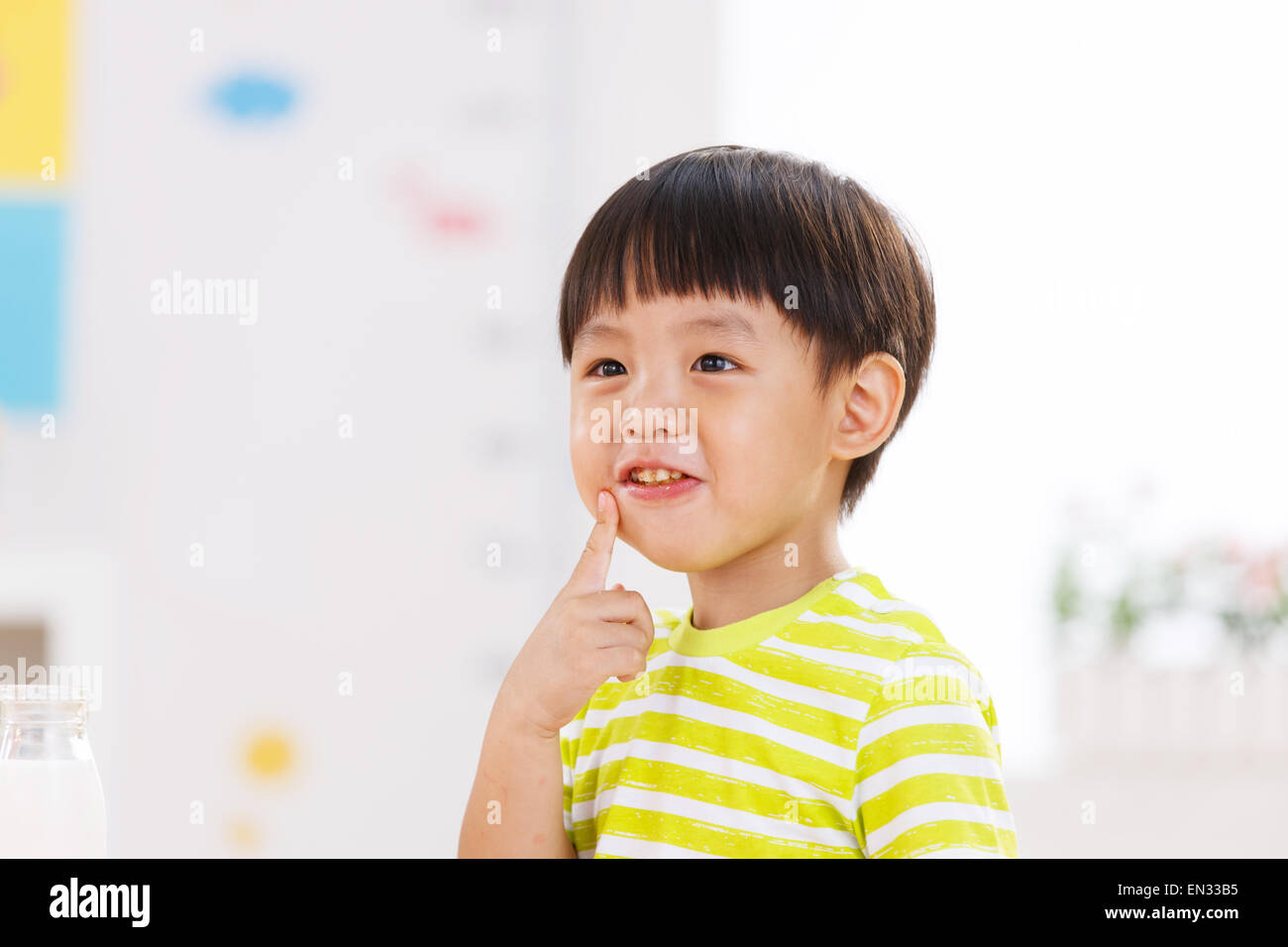 The little boy is chewing food Stock Photo - Alamy