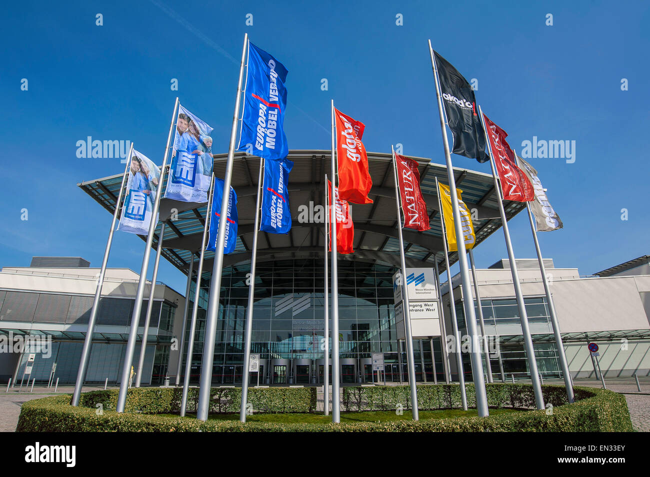 New Munich trade fair centre, west entrance with flags, Munich, Upper ...