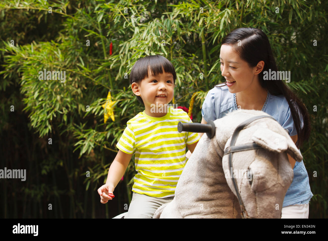 The kindergarten teacher and boys in outdoor Stock Photo - Alamy