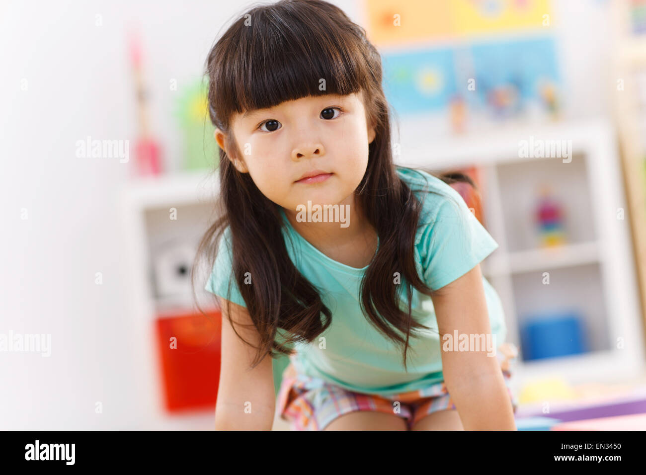 Lovely girl in the kindergarten Stock Photo - Alamy
