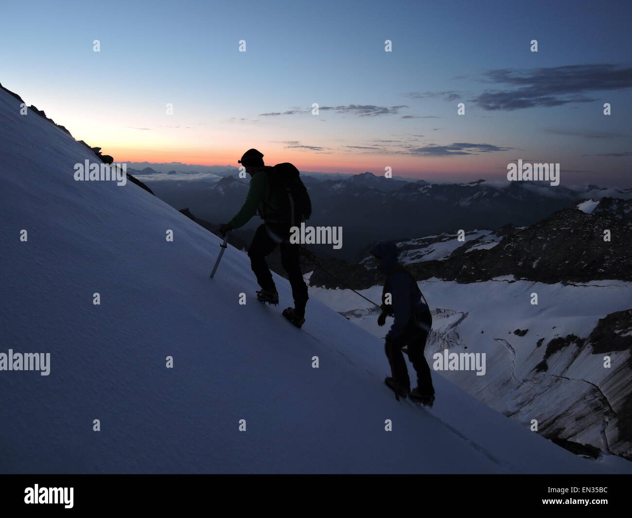 Climbers roped together, silhouette during the ascent to the 3631m ...