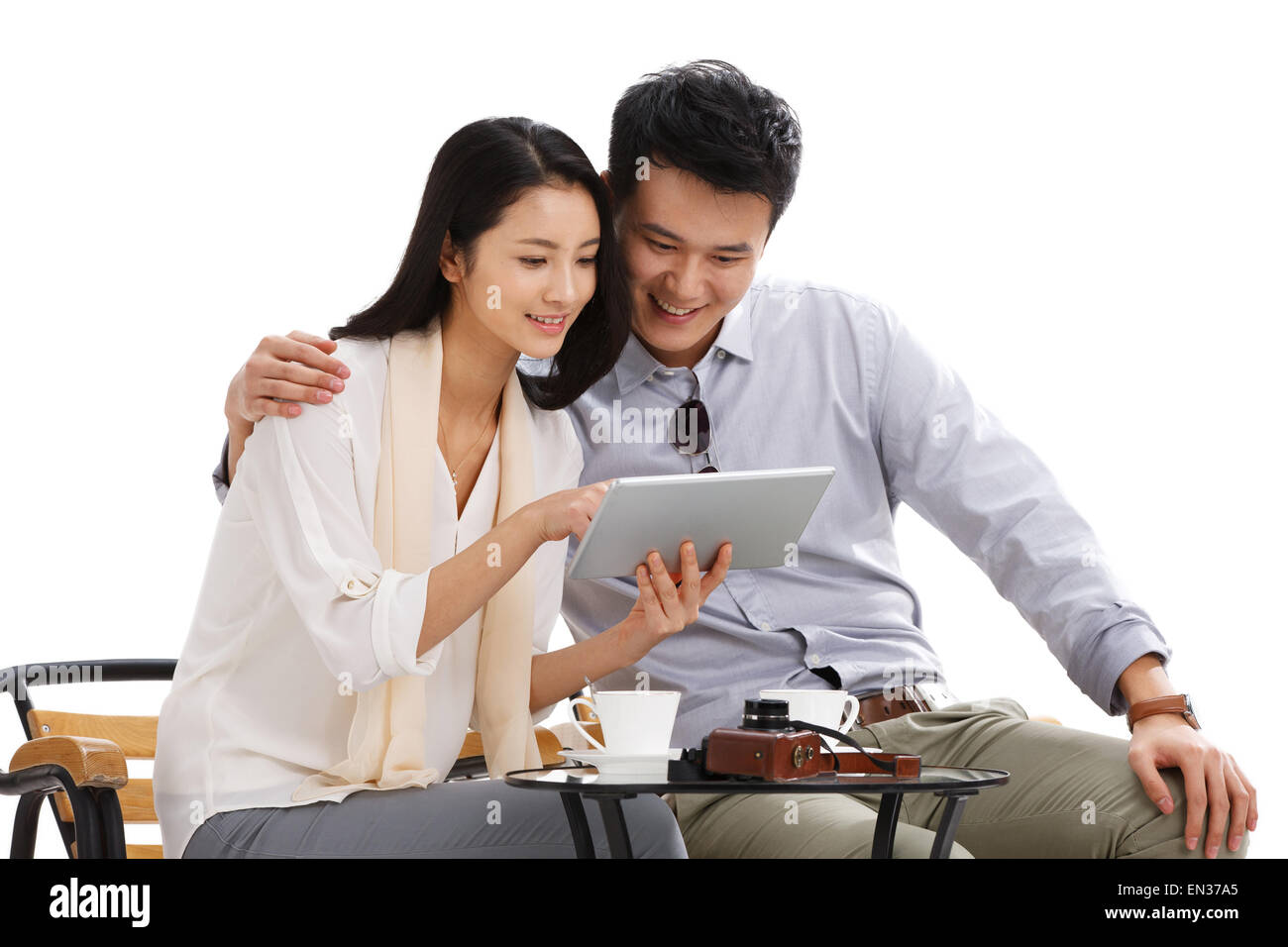 Young lovers in the use of the tablet computer Stock Photo - Alamy