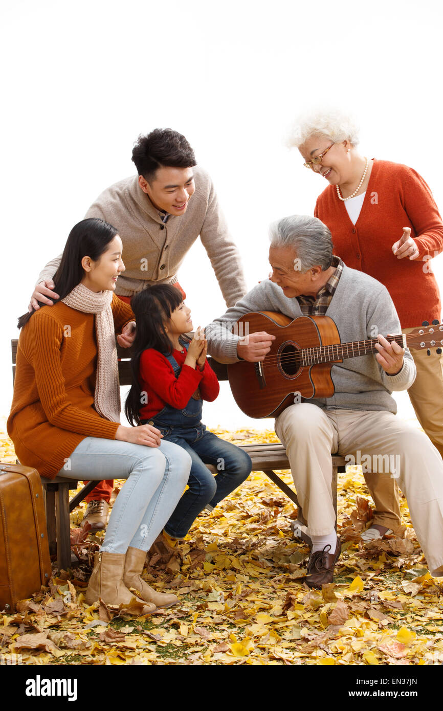 Happy family play outdoors Stock Photo - Alamy