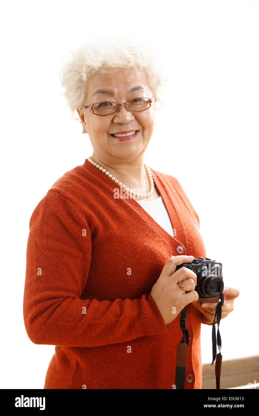The old woman took the camera Stock Photo - Alamy