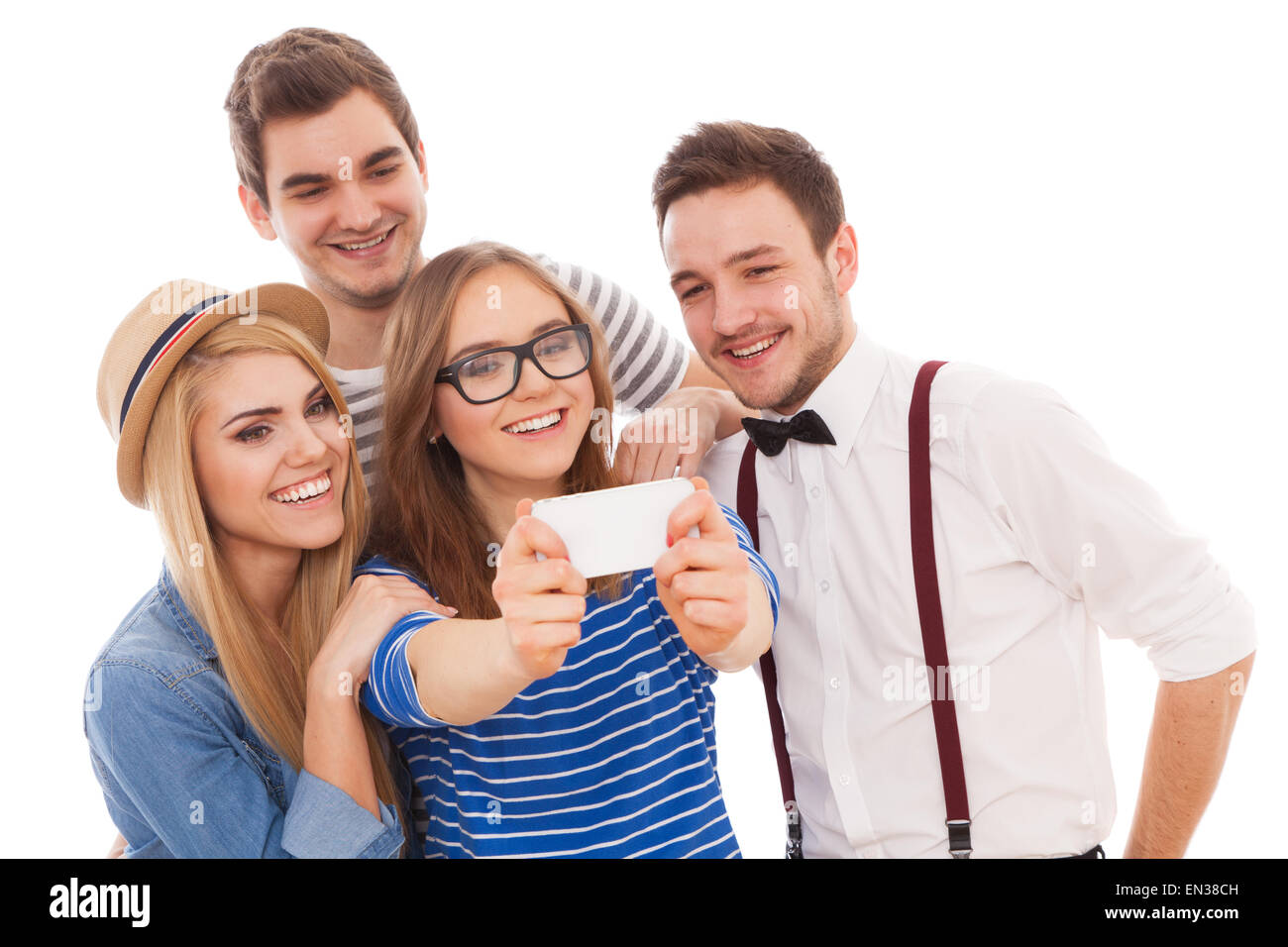 Four stylish young people on white background Stock Photo - Alamy