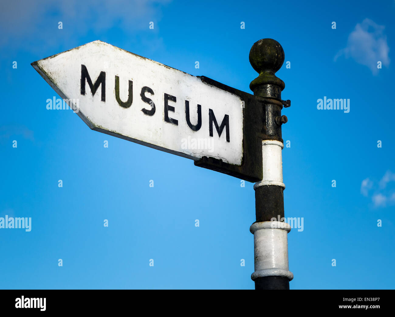 Vintage cast iron black and white museum signpost in Bakewell, UK Stock ...
