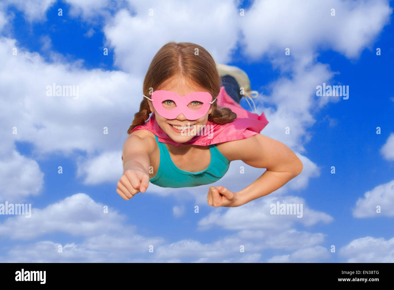 superhero travel flying concept or girl power Stock Photo - Alamy