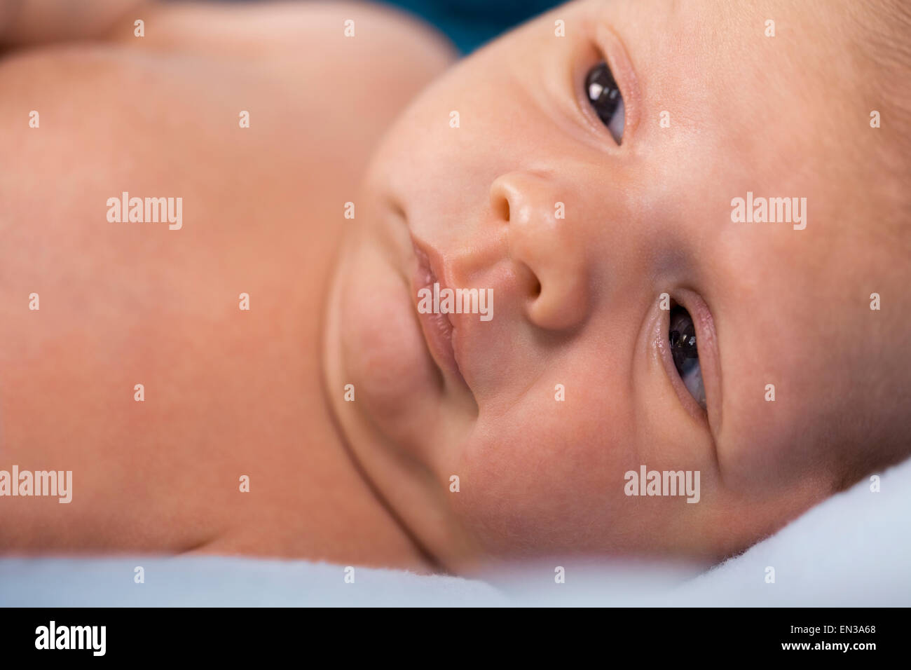 Close up Cute White New Born Baby Lying in Prone on White Cotton Cloth ...