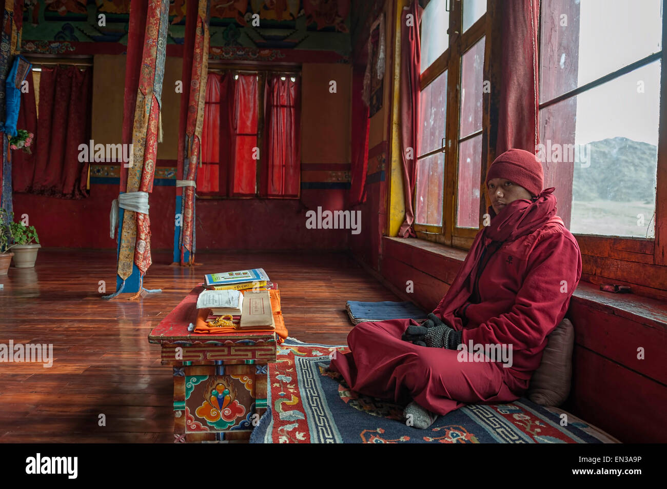 Monk is studding at monastery Stock Photo - Alamy