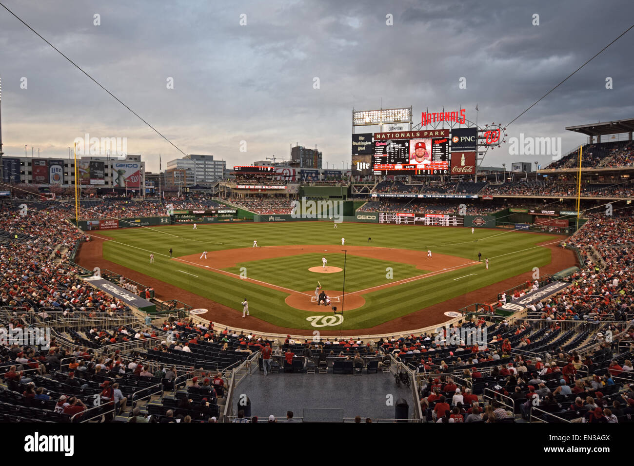 A wide view of a spring night baseball game at Nationals Park in ...